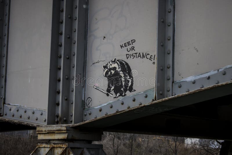 Raccoon Graffiti on Side of Bridge Stock Image - Image of help, child ...