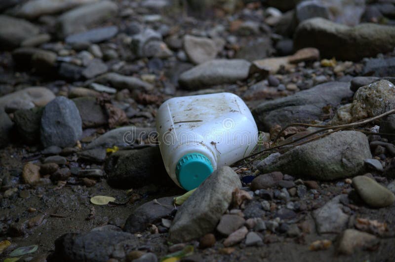 Trash in park at spring stock image. Image of environment - 328041283