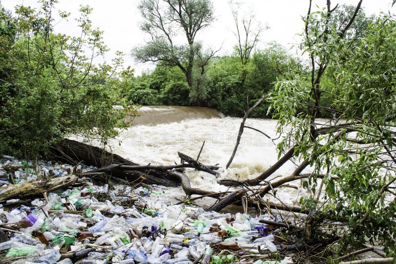 Trash in the river stock image. Image of water, nature - 18604641