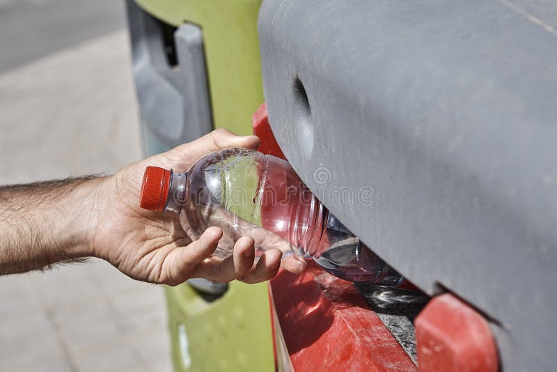 Trash Segregation, Man Putting Empty Plastic Bottle in Recycling Stock ...