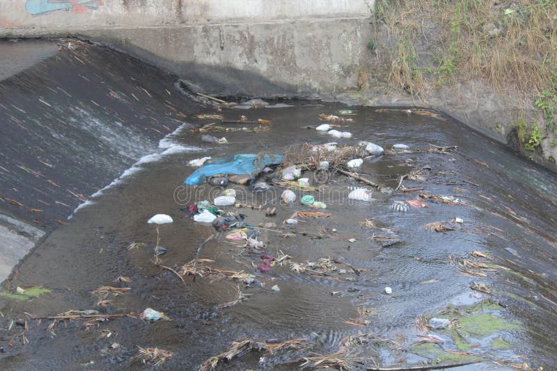 Trash Under the Bridge in Indonesia Stock Photo - Image of trashbag ...