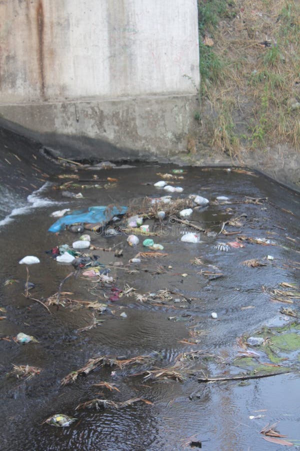 Trash Under the Bridge in Indonesia Stock Photo - Image of trashbag ...