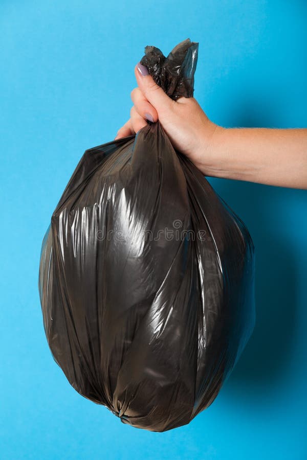 Trash, Waste, Trash Bag in Hand Stock Photo - Image of garbage, junk ...
