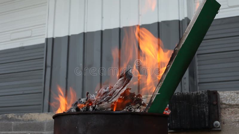 Trash Can Fire Rages in Steel Barrel Dumpster Can Stock Footage - Video ...
