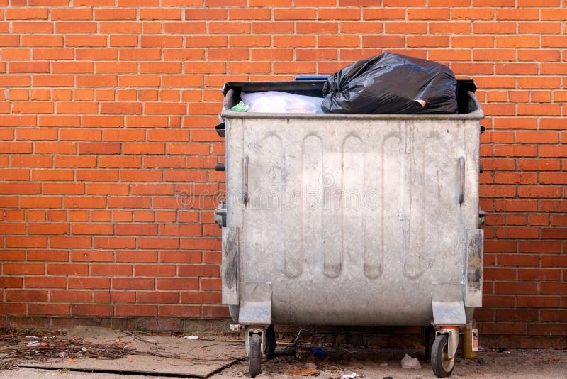 Trashcan full of garbage stock photo. Image of container - 144823634