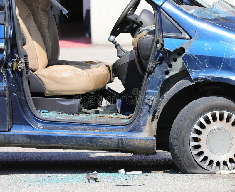 Trashed Car after Rioters Vandalized it during City Uprising Stock ...