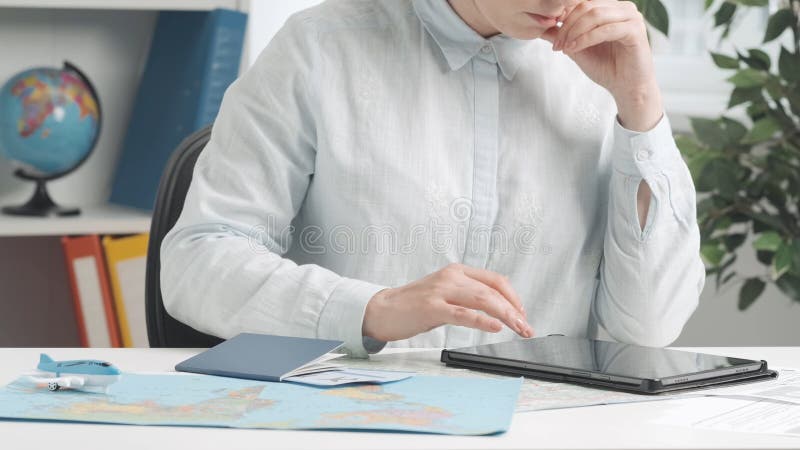 Planning a Trip with Modern Technology at a Travel Agency Stock Image ...