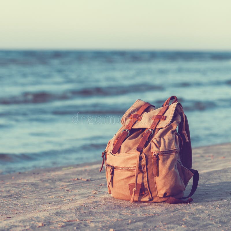 Travel Backpack on Sea Beach. Stock Photo - Image of knapsack ...