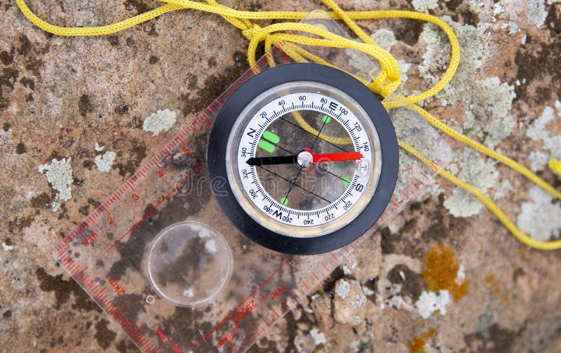 The Travel Compass on the Ground. Stock Image - Image of mountain ...