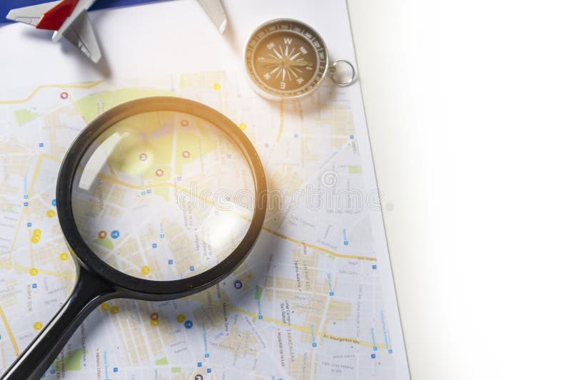 Travel Compass and Magnifying Glass. ,identifying a Destination and ...