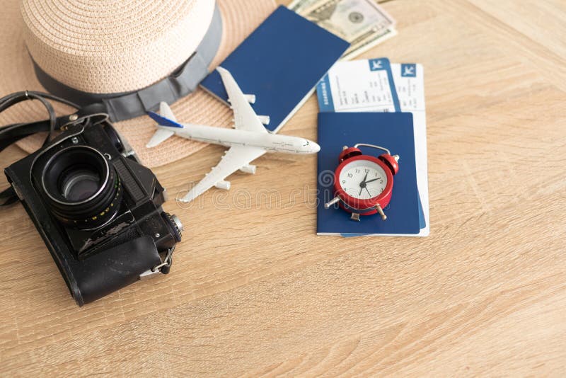 Travel Concept. Airplane Model, Camera and Passport on the Table. Stock ...
