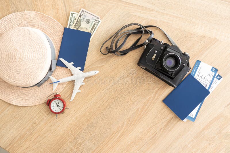 Travel Concept. Airplane Model, Camera and Passport on the Table. Stock ...