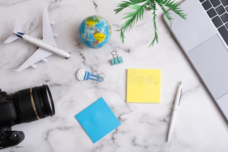 Travel Flat Lay Composition on Working Table Laptop, Camera, Airplane ...