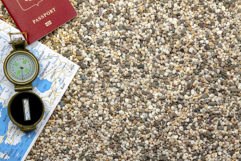 Travel Planning Concept. Compass, Passport, Map Lie on the Sand from ...