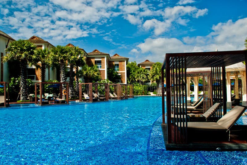 Travel pool resort stock photo. Image of poolside, beds - 31764368