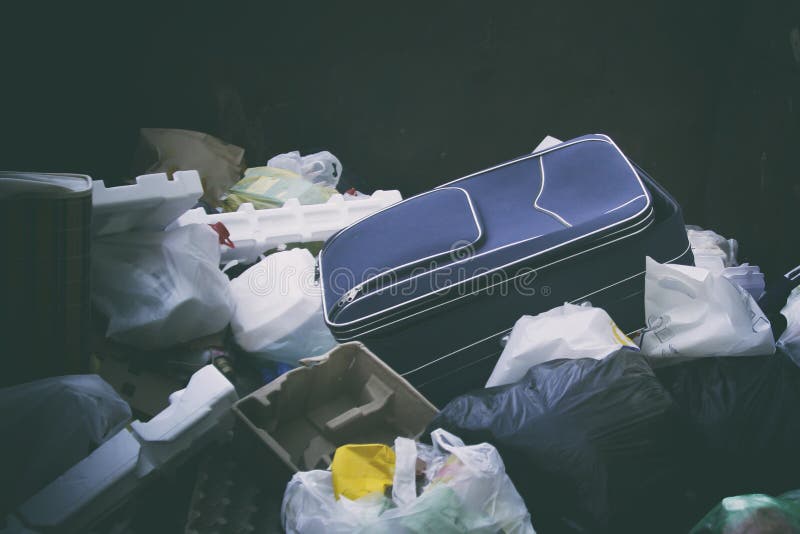 Travel Suitcase for Air Travel in the Trash in the Trash among the ...