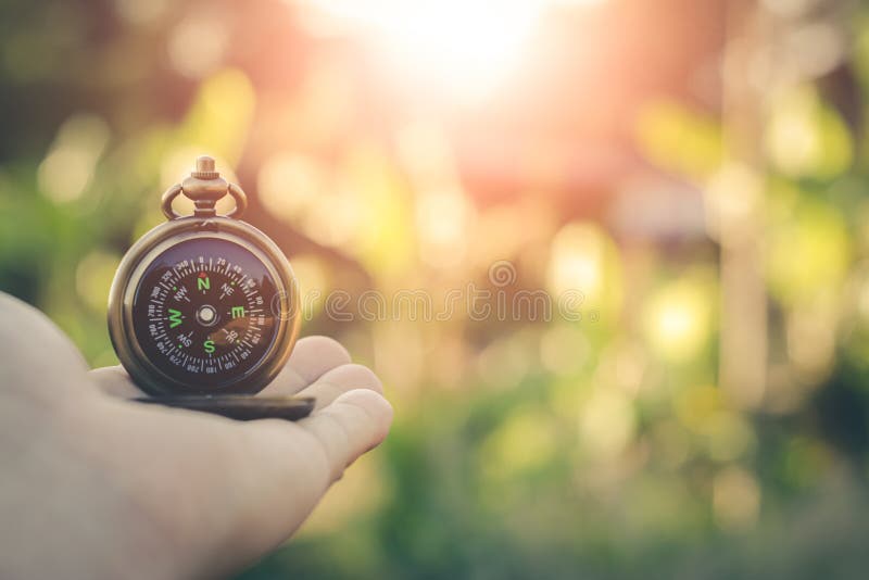 Travel of Tourists with Compass. Compass of Tourists on Mountain Stock ...