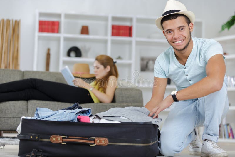 Travel and Vacation Concept Happiness Young Man Packing Stock Photo ...
