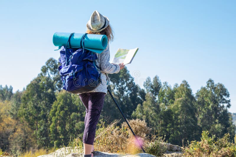 Travel woman with backpack stock photo. Image of mountain - 218558984