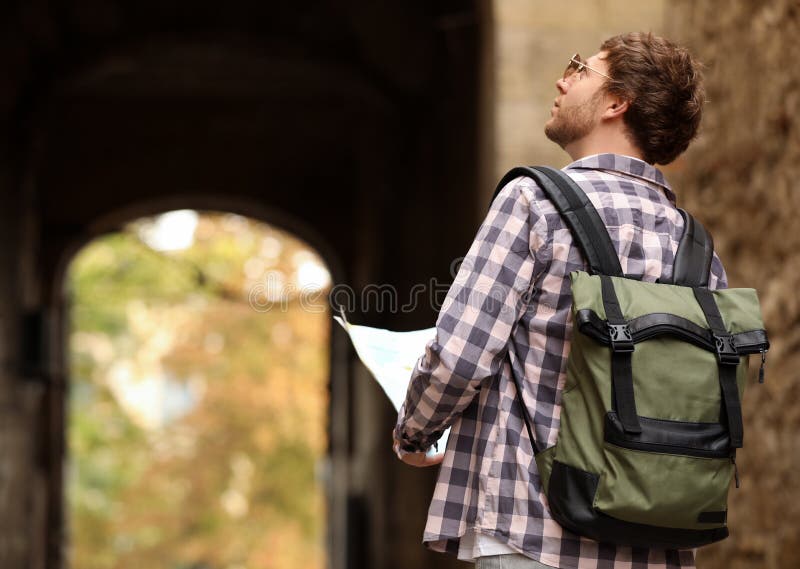 Traveler with Backpack on City Street, Back View Stock Photo - Image of ...