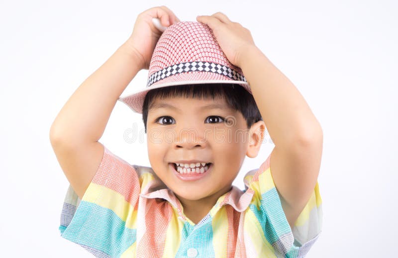 Traveler Boy Putting on His Hat Stock Photo - Image of portrait ...