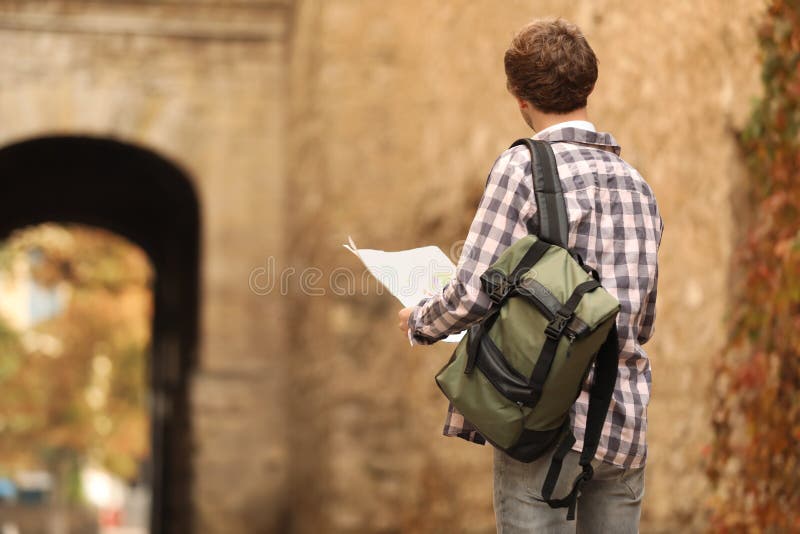Traveler with Map on City Street, Back View Stock Photo - Image of city ...