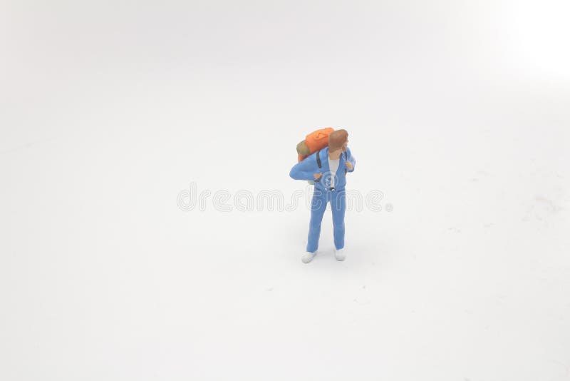 A Traveler Mini People with Backpack Stand Stock Photo - Image of ...