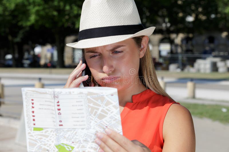 Traveler on Phone Reading Map Lost in City Stock Photo - Image of adult ...