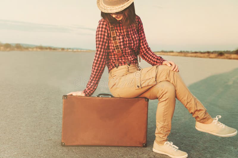 Traveler Sitting on Suitcase Stock Image - Image of fashioned, case ...