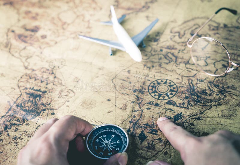 Traveler is Using Compass and Vintage Map Stock Image - Image of ...