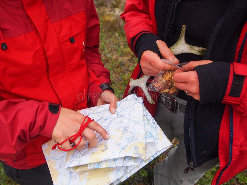 Travelers Checking the Location Point on the Map Stock Image - Image of ...