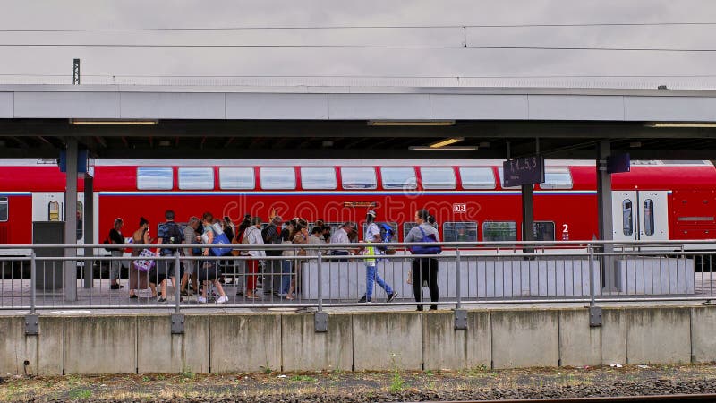 Travelers Crowd an Exit Staircase at a Train Station in Germany ...