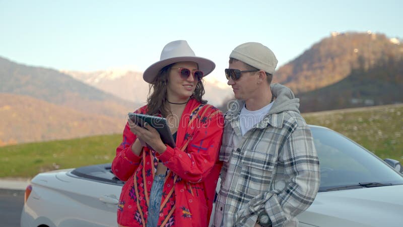 Travelers Using Electronic Map in Tablet, Navigating by Online ... Travelers Using Electronic Map in Tablet, Navigating by Online ...