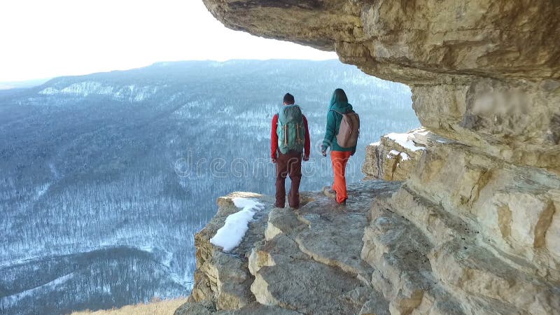 Travelers Walking on Edge of Cliff Stock Footage - Video of backpacker ...