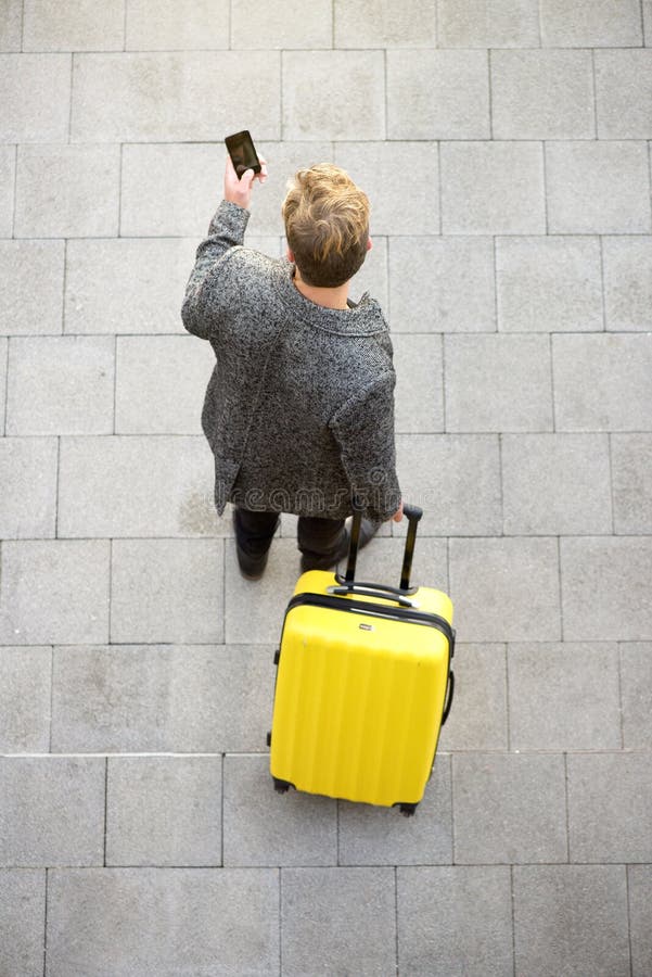 Traveling Man Walking with Mobile Phone Ad Suitcase Stock Photo - Image ...