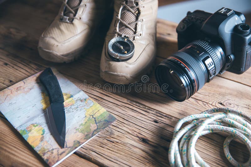 Traveling Shoe and Compass with Camera on Table Stock Image - Image of ...