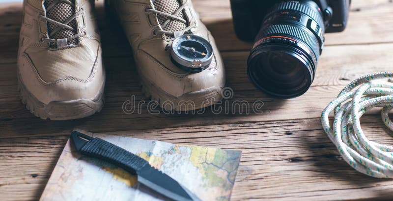 Traveling Shoe and Compass with Camera on Table Stock Photo - Image of ...