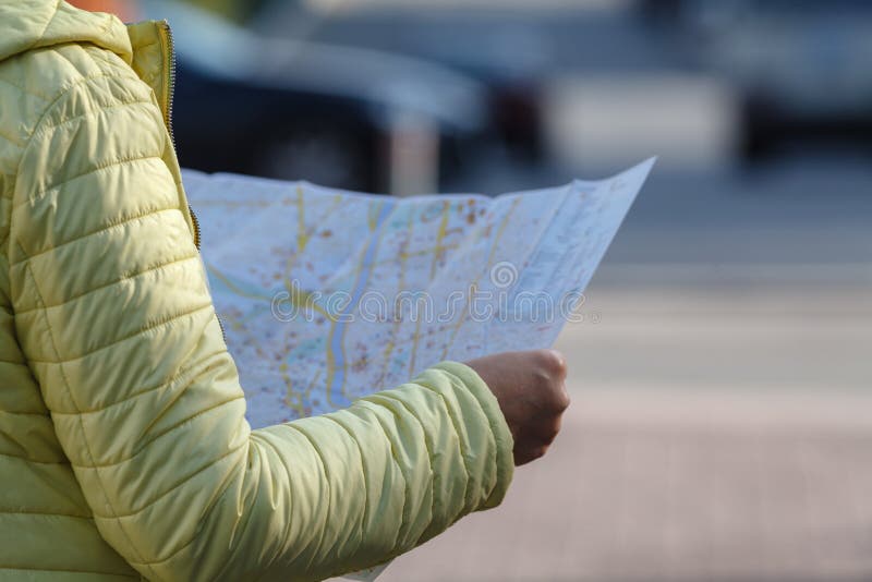 Traveling Using Map. Female Holding Map in Hands Stock Photo - Image of ...