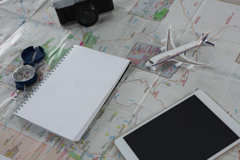 Travelling Accessories on Map Stock Photo - Image of navigational ...