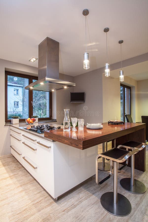 Travertine House - Kitchen with TV Stock Image - Image of comfortable ...