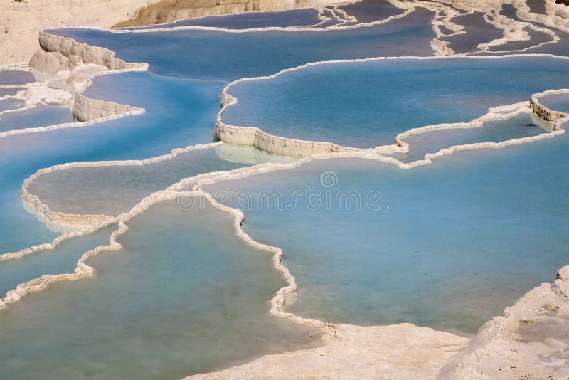 Travertine Pools in Pamukkale, Turkey Stock Photo - Image of reflected ...