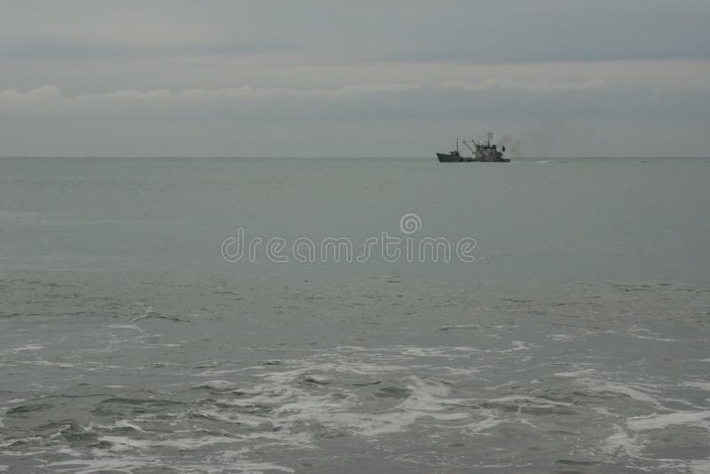 A trawl ship. stock image. Image of vessel, grey, horizon - 84687749