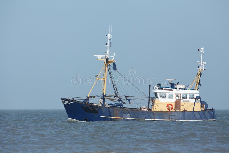 Trawler stock image. Image of channel, blue, coast, ostend - 18789777
