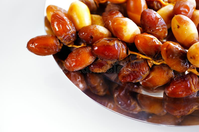 Arabic Dates on a White Plate with Arabic Coffee Cups Stock Photo ...