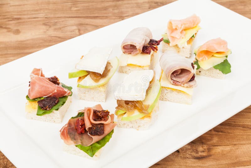 Tray with assorted snacks stock image. Image of bacon - 111488113