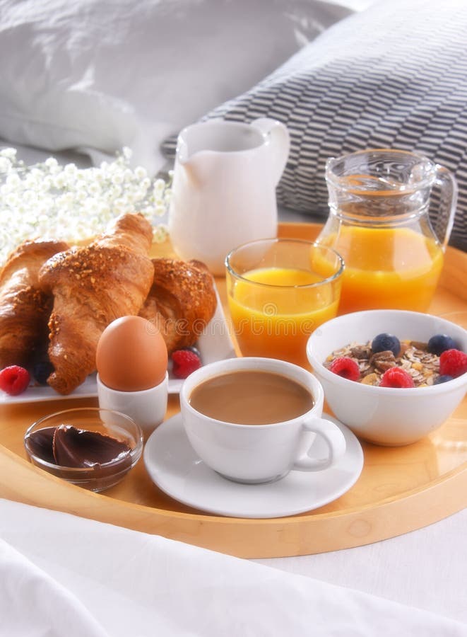 A Tray with Breakfast on a Bed in a Hotel Room Stock Photo - Image of ...