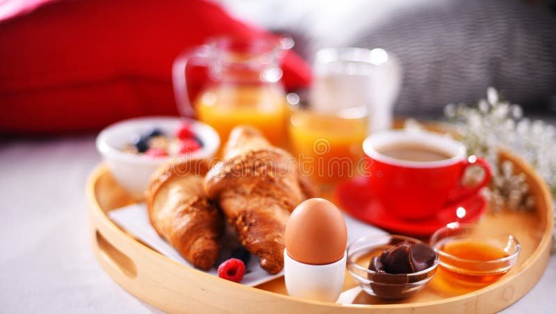 A Tray with Breakfast on a Bed in a Hotel Room Stock Photo - Image of ...