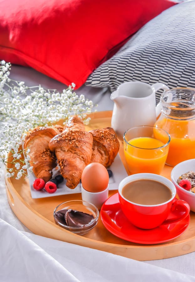 A Tray with Breakfast on a Bed in a Hotel Room Stock Photo - Image of ...