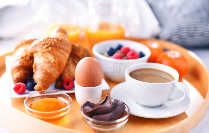 A Tray with Breakfast on a Bed in a Hotel Room Stock Photo - Image of ...