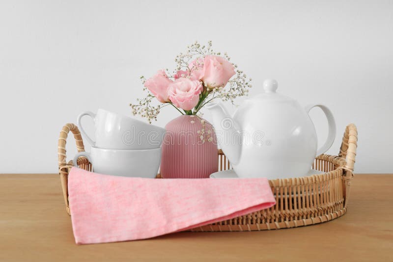 Tray with Tea Set and Beautiful Bouquet on Wooden Table Stock Image ...